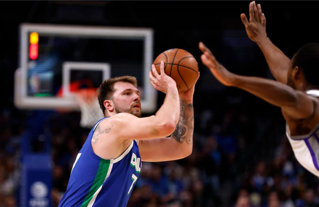 Luka Doncic Keeps Making Crazy Trick Shots From The Sidelines